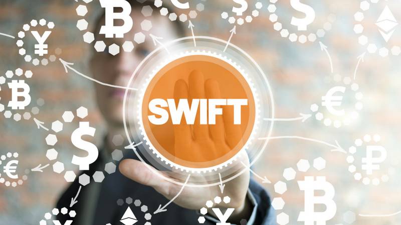 SWIFT mejora su sistema de pagos interbancario y coquetea con la blockchain